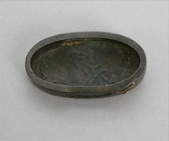 A Japanese Sword End Cap in Mixed Metals, 05.20.06, Sold: $51.75