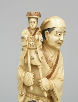 A Signed Ivory Carving of a Puppet Master , 03.01.07
