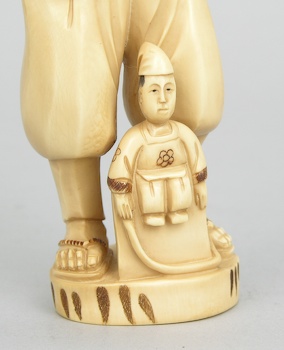 A Signed Ivory Carving of a Puppet Master , 03.01.07