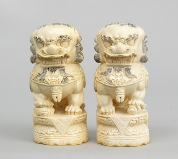 A Pair of Carved Ivory Foo Dogs , 09.21.07, Sold: $276