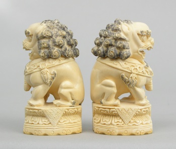 A Pair of Carved Ivory Foo Dogs , 09.21.07, Sold: $276