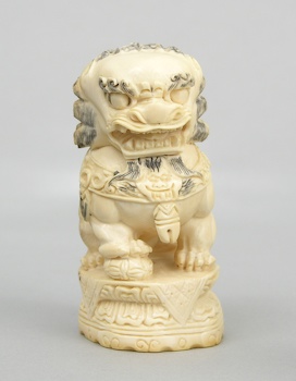 A Pair of Carved Ivory Foo Dogs , 09.21.07, Sold: $276