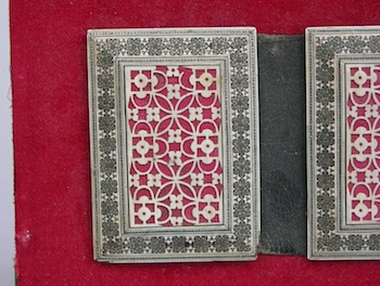 A Miniature Inlaid Ivory Book Cover , 11.20.08, Sold: $86.25