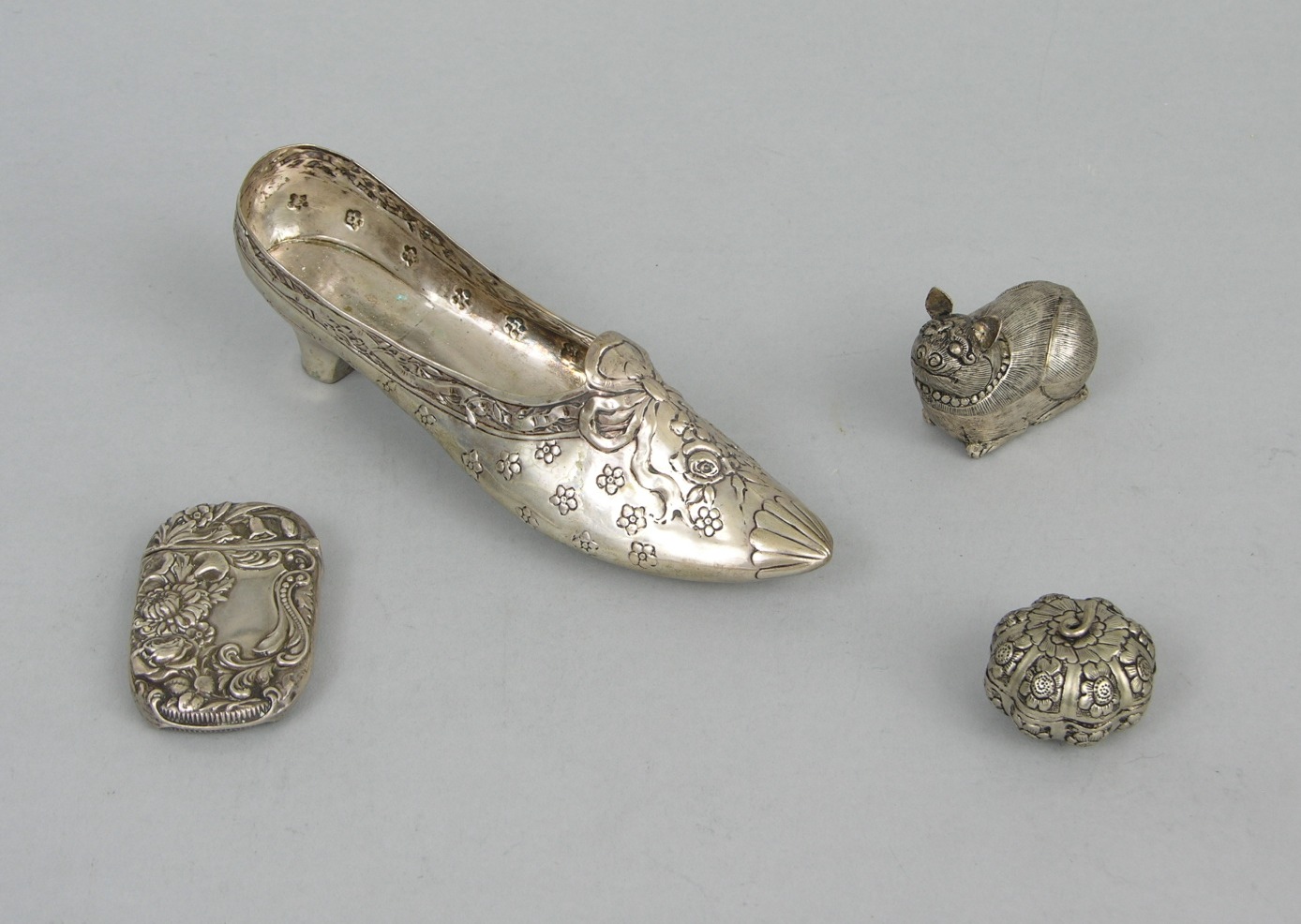 A Collection of Hand Chased Silver Metal Items, Various Makers , 05.14. ...