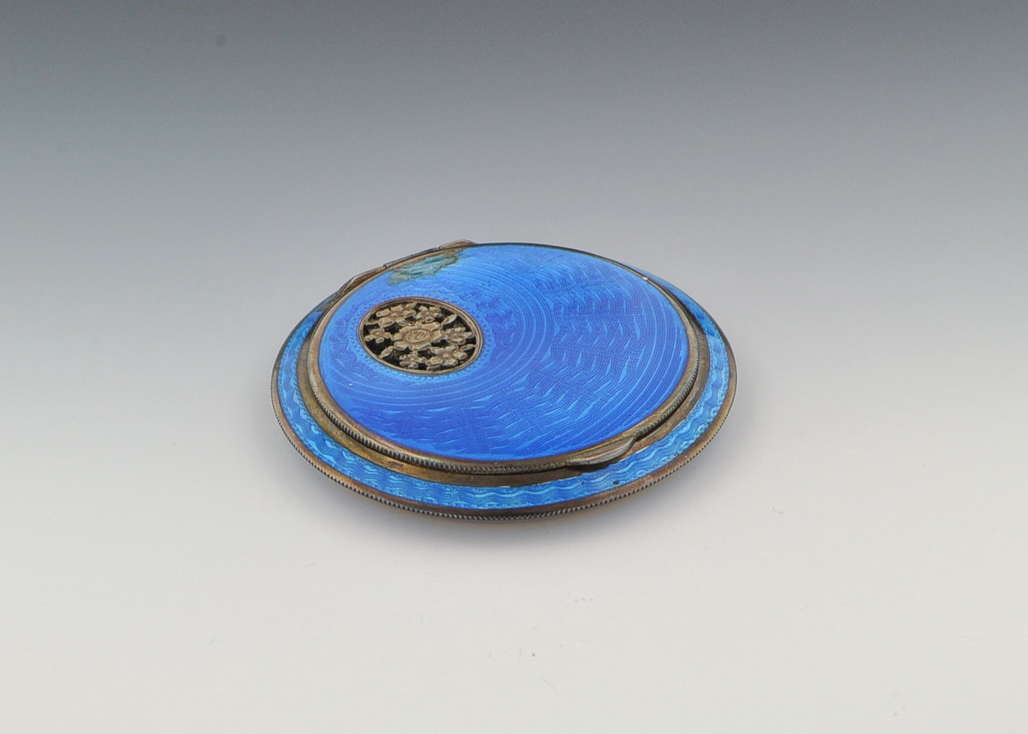 An Austrian Sterling Silver and Guilloche Enamel Compact, 09.10.09 ...