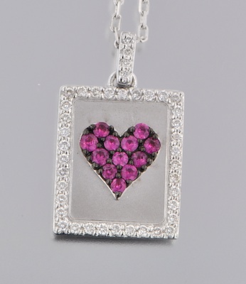 A Diamond and Ruby "Ace of Hearts" Pendant with Chain by Mirabelle , 03 ...