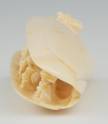A Carved Ivory Clam Shell with Figures Inside, 11.18.10, Sold: $161