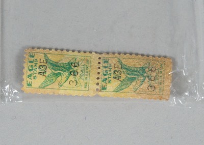 A Vintage Eagle Stamps Advertisement Clock, 09.25.10, Sold: $460