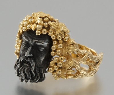 A Spanish 18k and Steel Bacchus Ring by CARRERA Y CARRERA, 09.24.10 ...