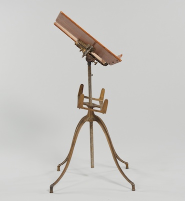 A Cast Iron and Wood Dictionary Stand, 04.02.11, Sold: $115