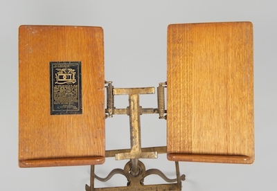 A Cast Iron and Wood Dictionary Stand, 04.02.11, Sold: $115