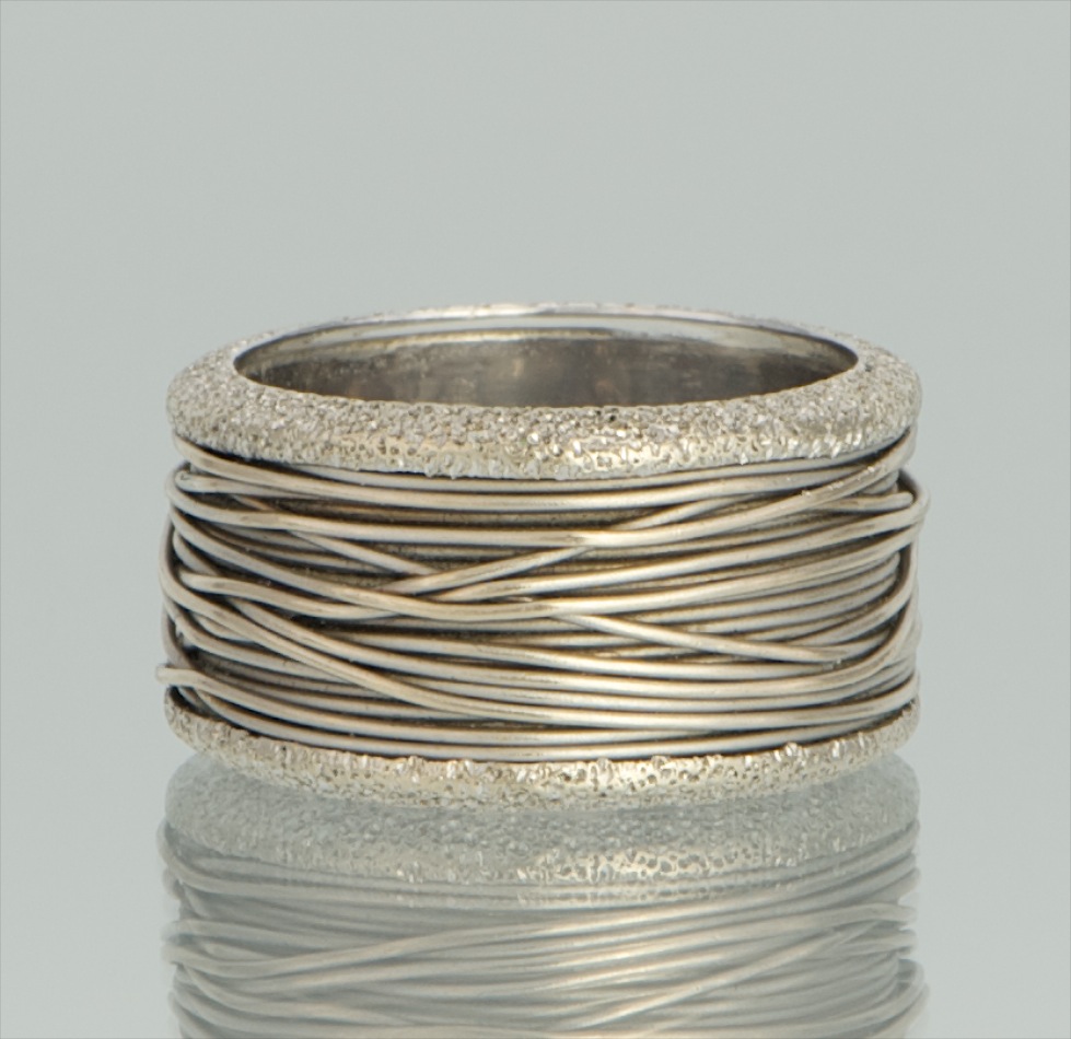 A White Gold Thread and Diamond Band , 03.29.12, Sold: $460