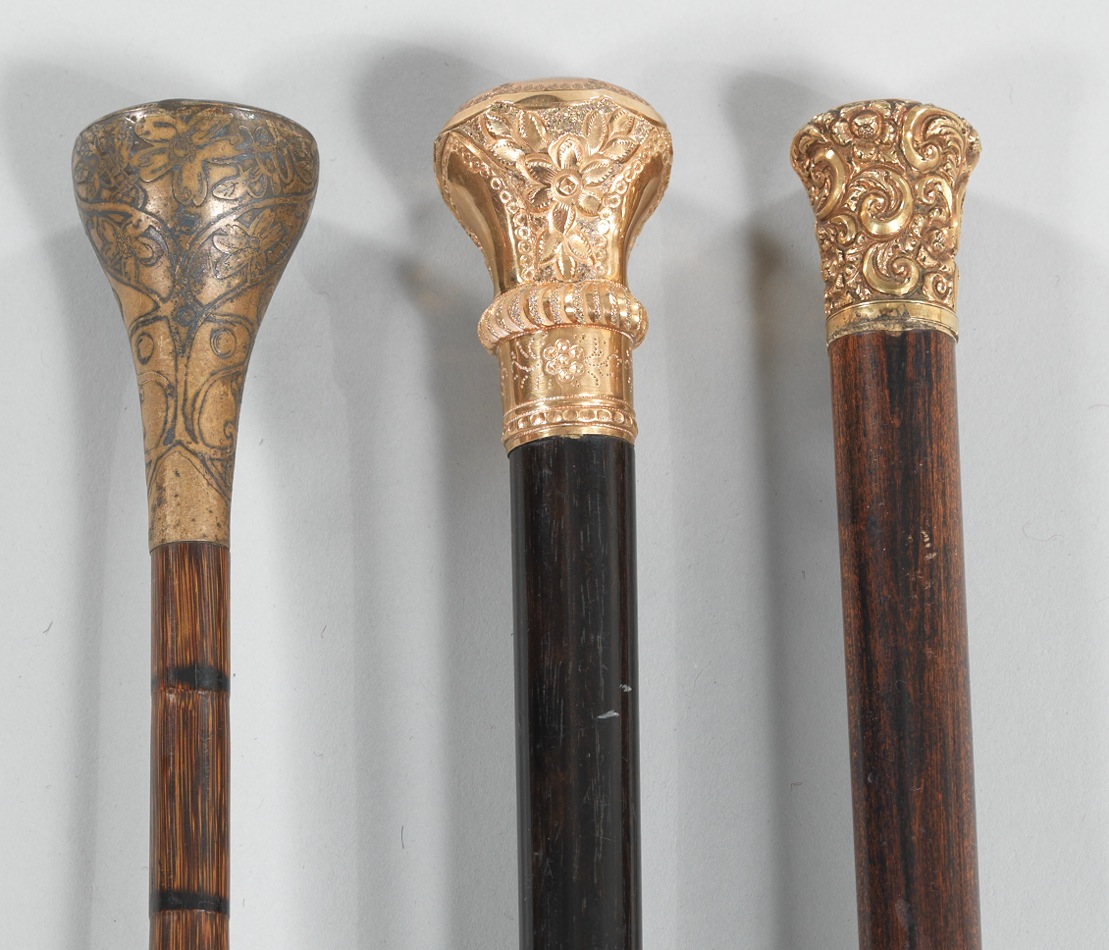 Two Antique Walking Sticks and a Parasol Frame, 09.08.12, Sold: $207