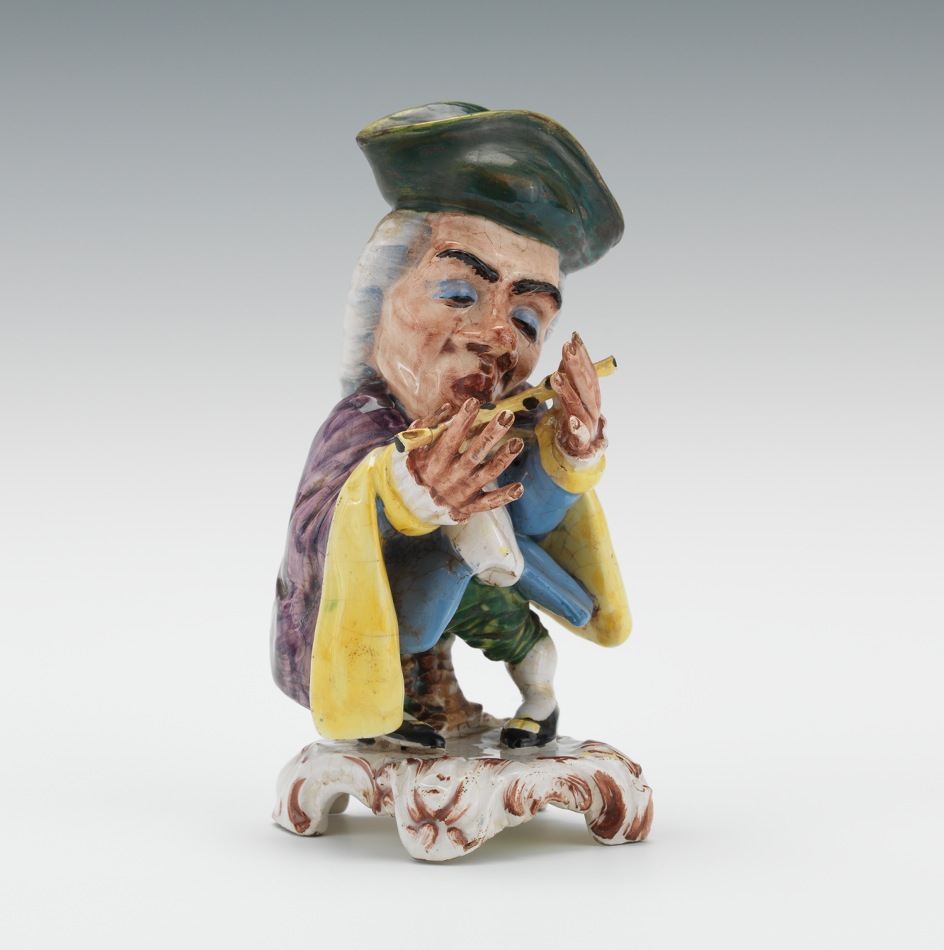 An Italian Majolica Figurine of a Dwarf Musician, 10.18.12, Sold: $69