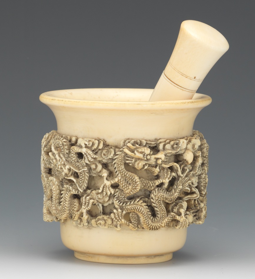 A Carved Ivory Dragon Mortar and Pestle, 05.25.13, Sold: $356.5