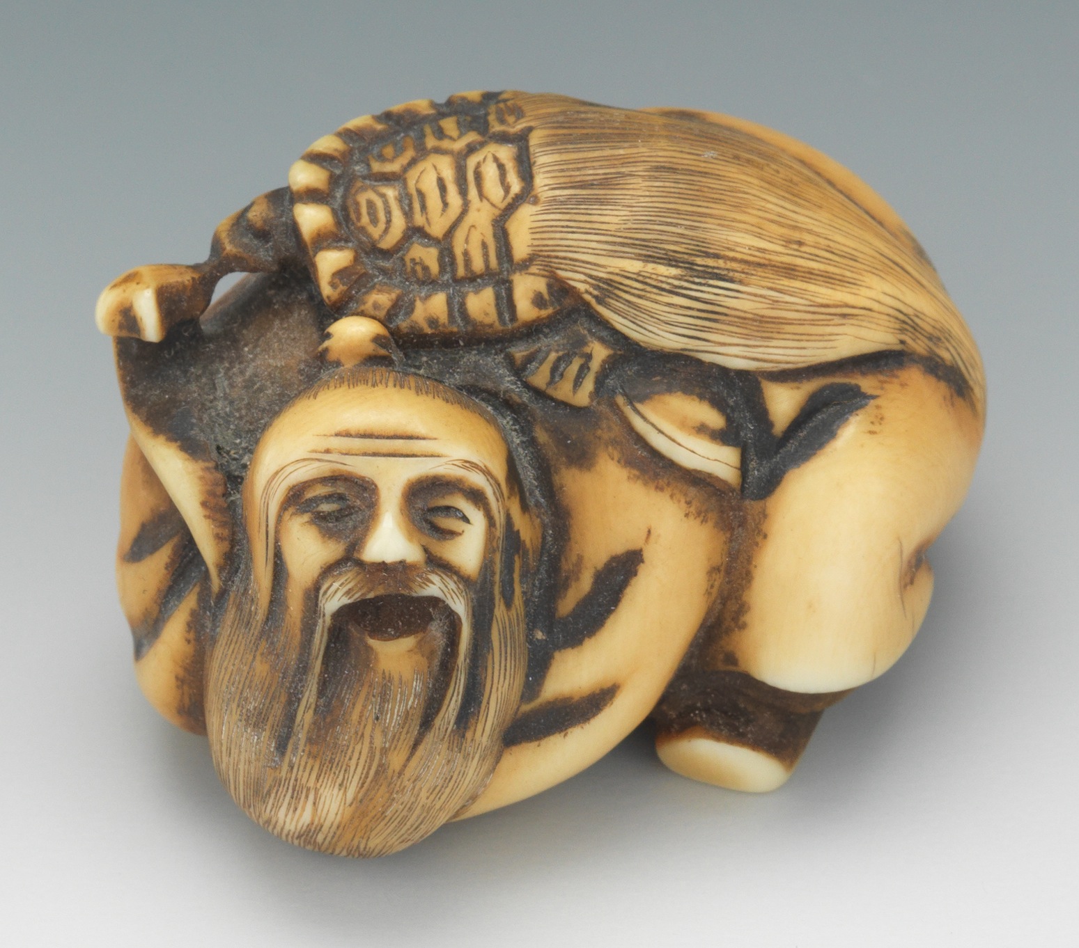 High resolution image for A Carved Netsuke of a Monk and Turtle