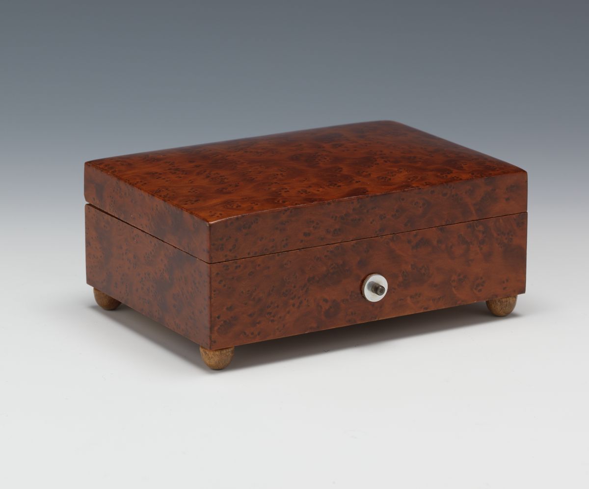 A Thorens Musical Box in Burled Wood Veneer, 06.19.14, Sold: $161